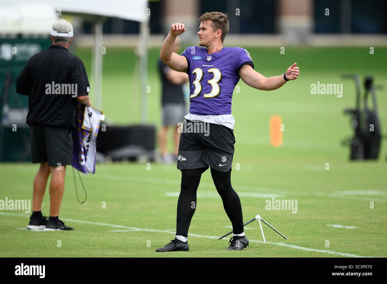 Baltimore Ravens place kicker Tyler Loop (33) works out during practice ...