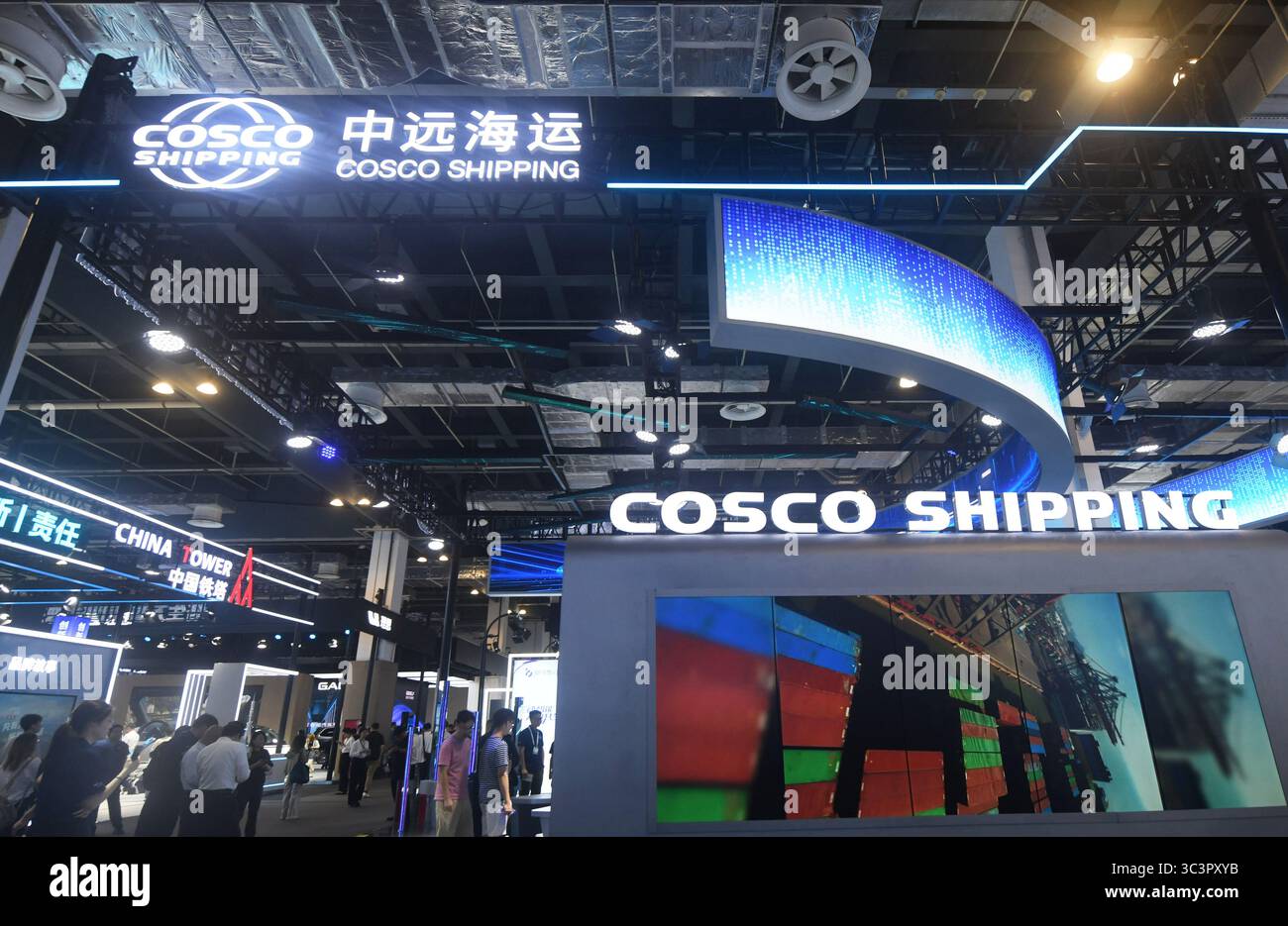SHANGHAI, CHINA - JULY 26, 2025 - Visitors visit the booth of COSCO ...