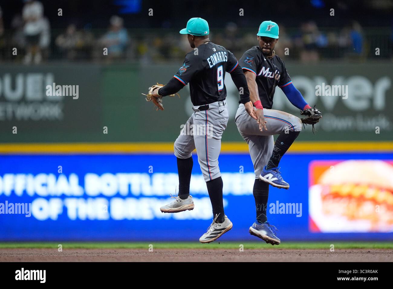 Miami Marlins' Xavier Edwards (9) celebrates with Otto Lopez, right ...