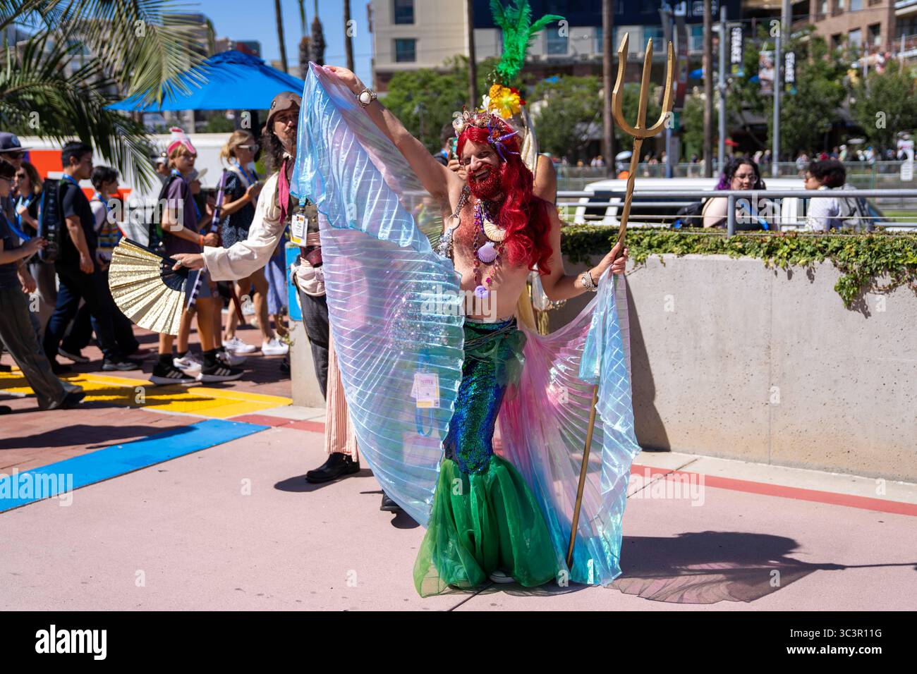 A cosplayer offers a playful and colorful twist on The Little Mermaid ...