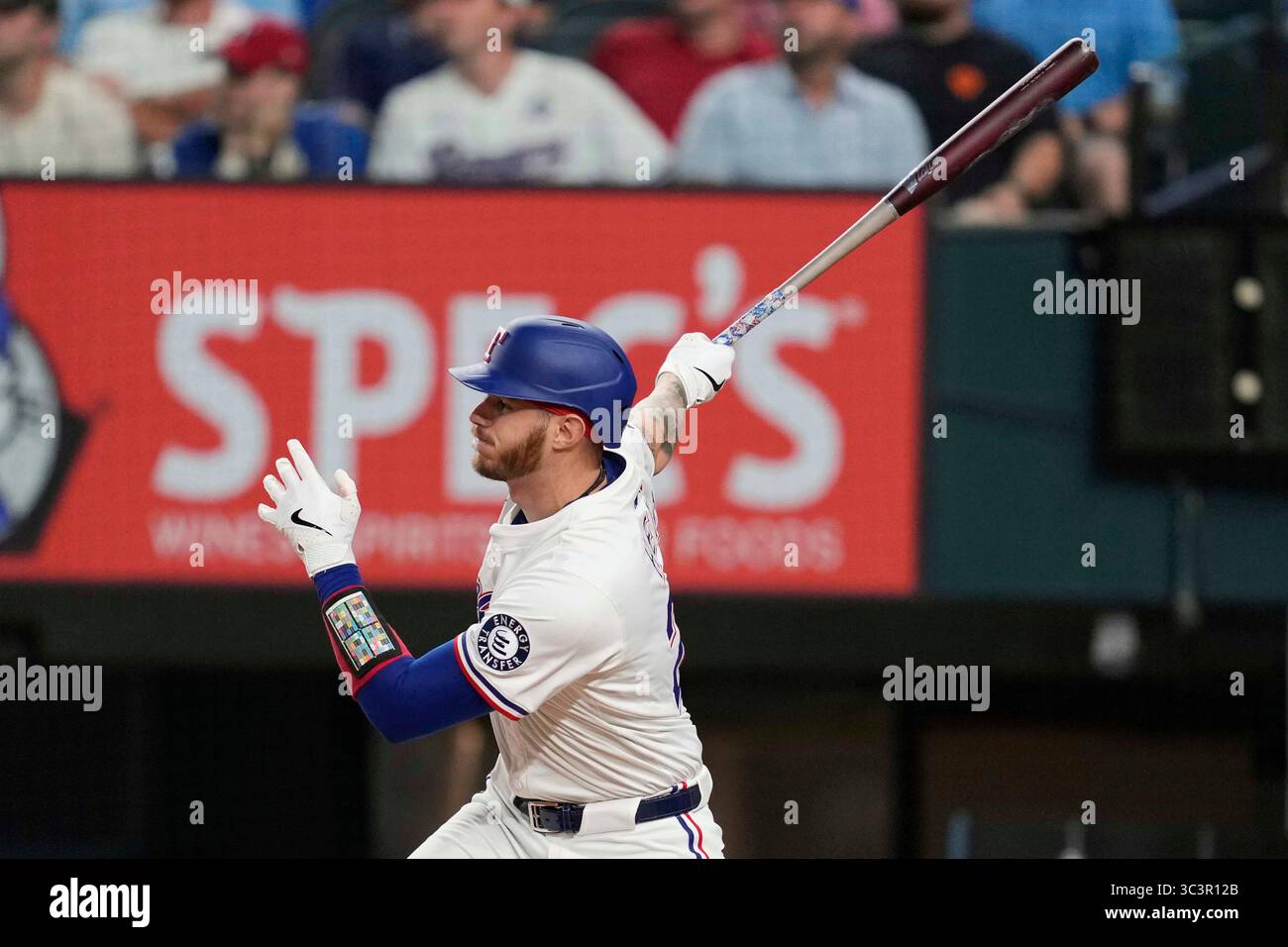 Texas Rangers' Jonah Heim follows through on a run-scoring double that ...