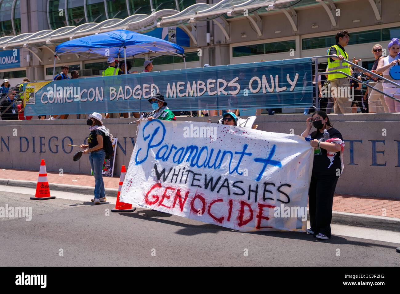 Protesters gather outside the San Diego Convention Center during Comic ...