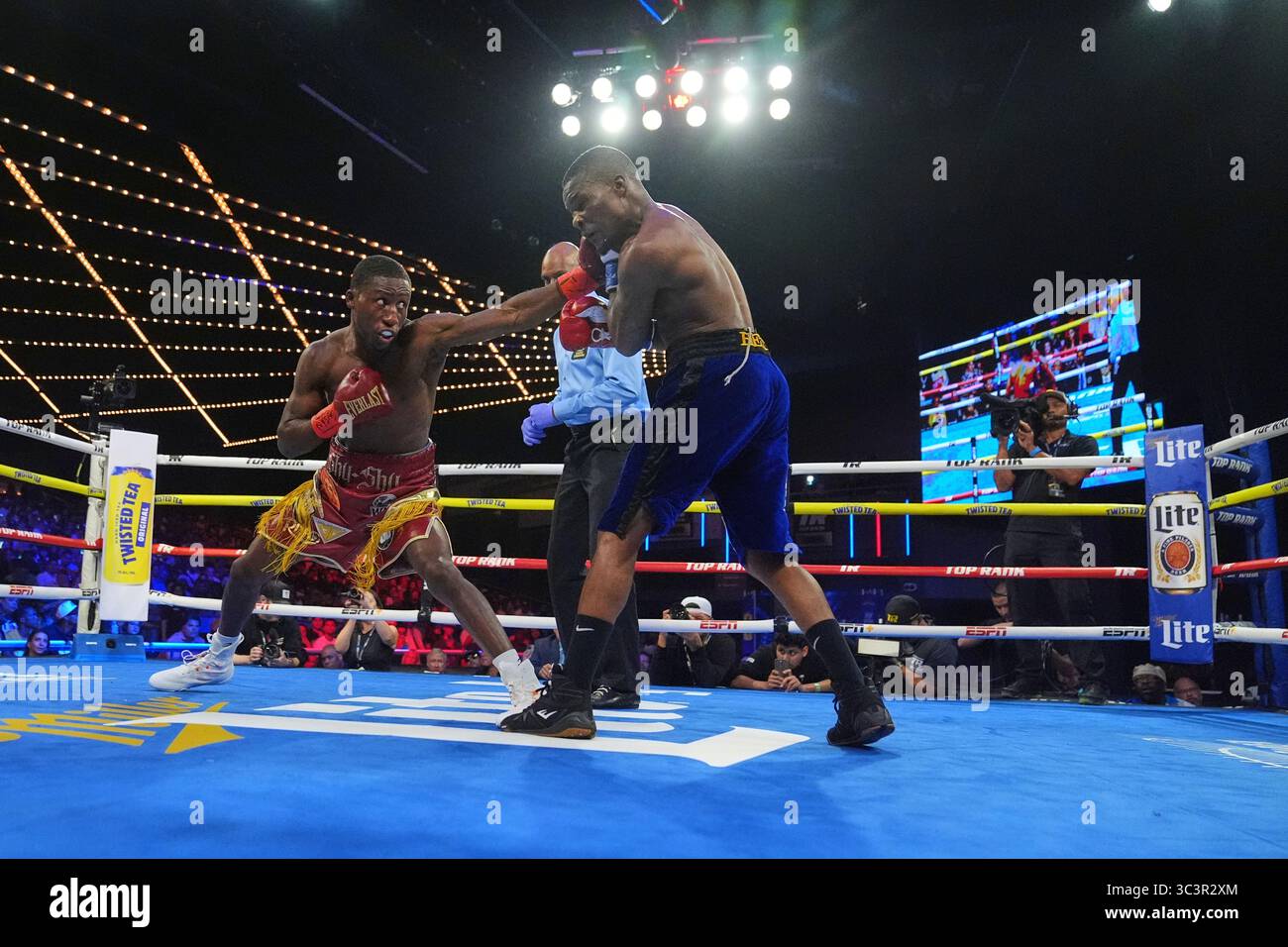 Bruce Carrington, left, punches Namibia's Mateus Heita during the first ...