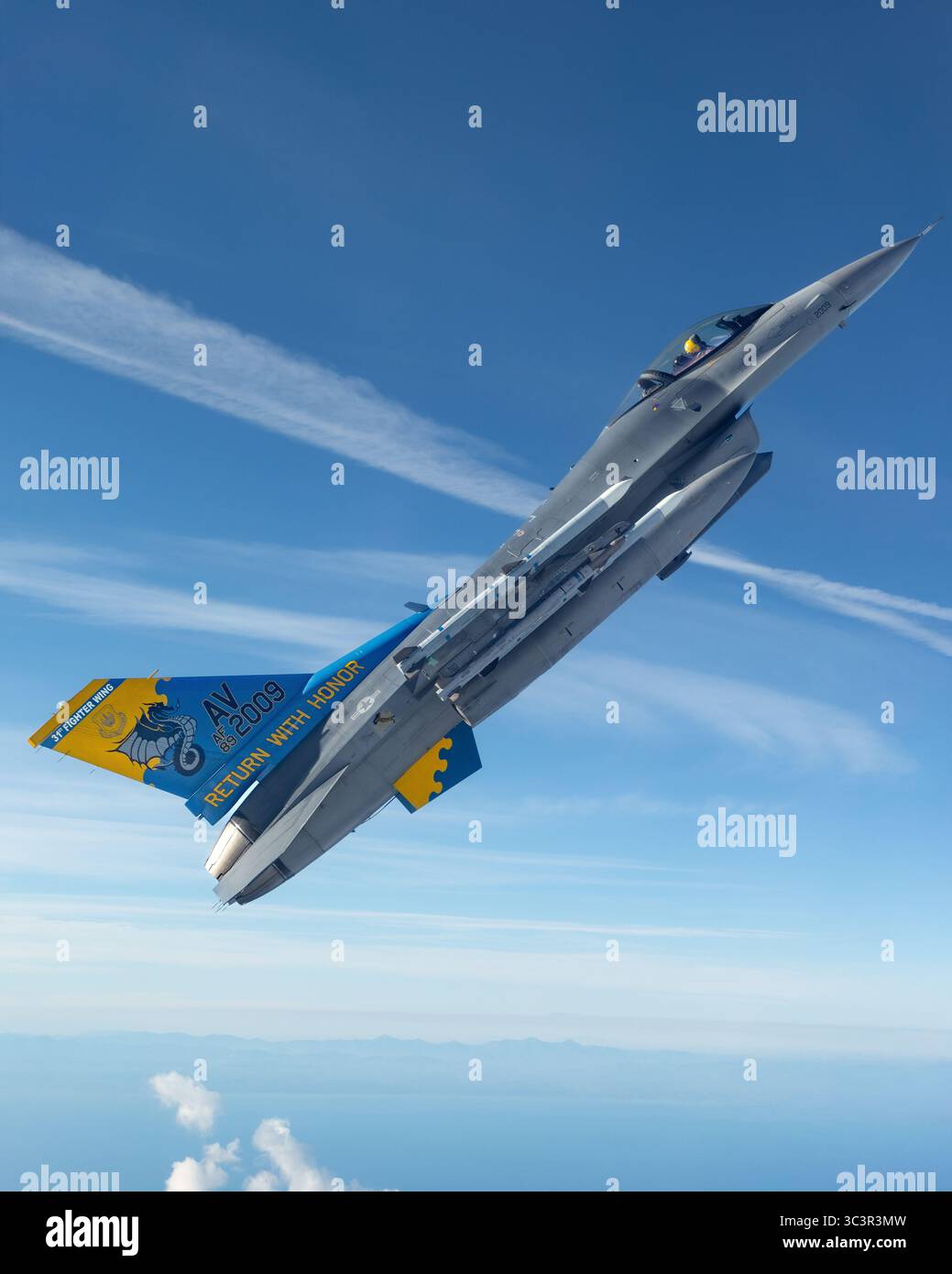 An F-16 Fighting Falcon from the 31st Fighter Wing flies above Aviano ...