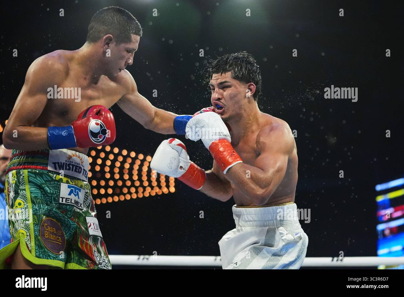 Puerto Rico's Jorge Gonzalez-Sanchez, left, Puerto Rico's Xander Zayas ...
