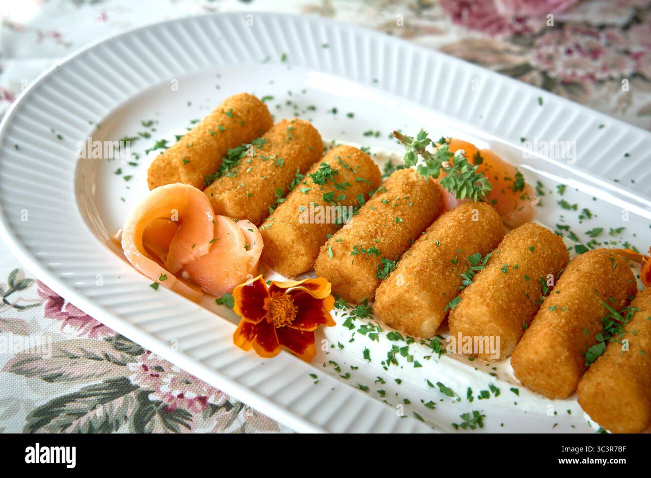 A Deliciously Plated Dish featuring Golden-Brown Croquettes Garnished ...