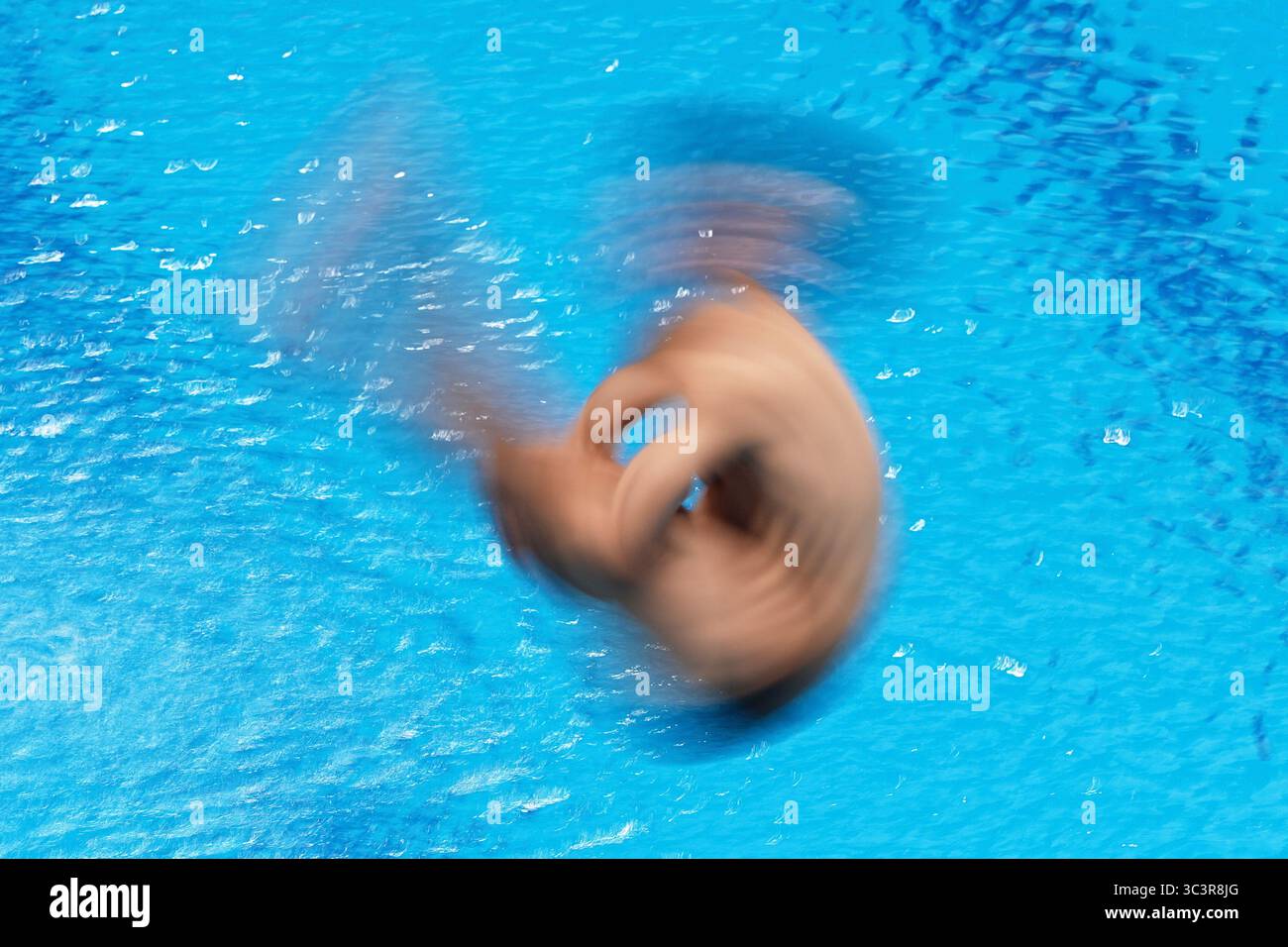Yan Siyu of China competes in the men's 1m springboard diving ...