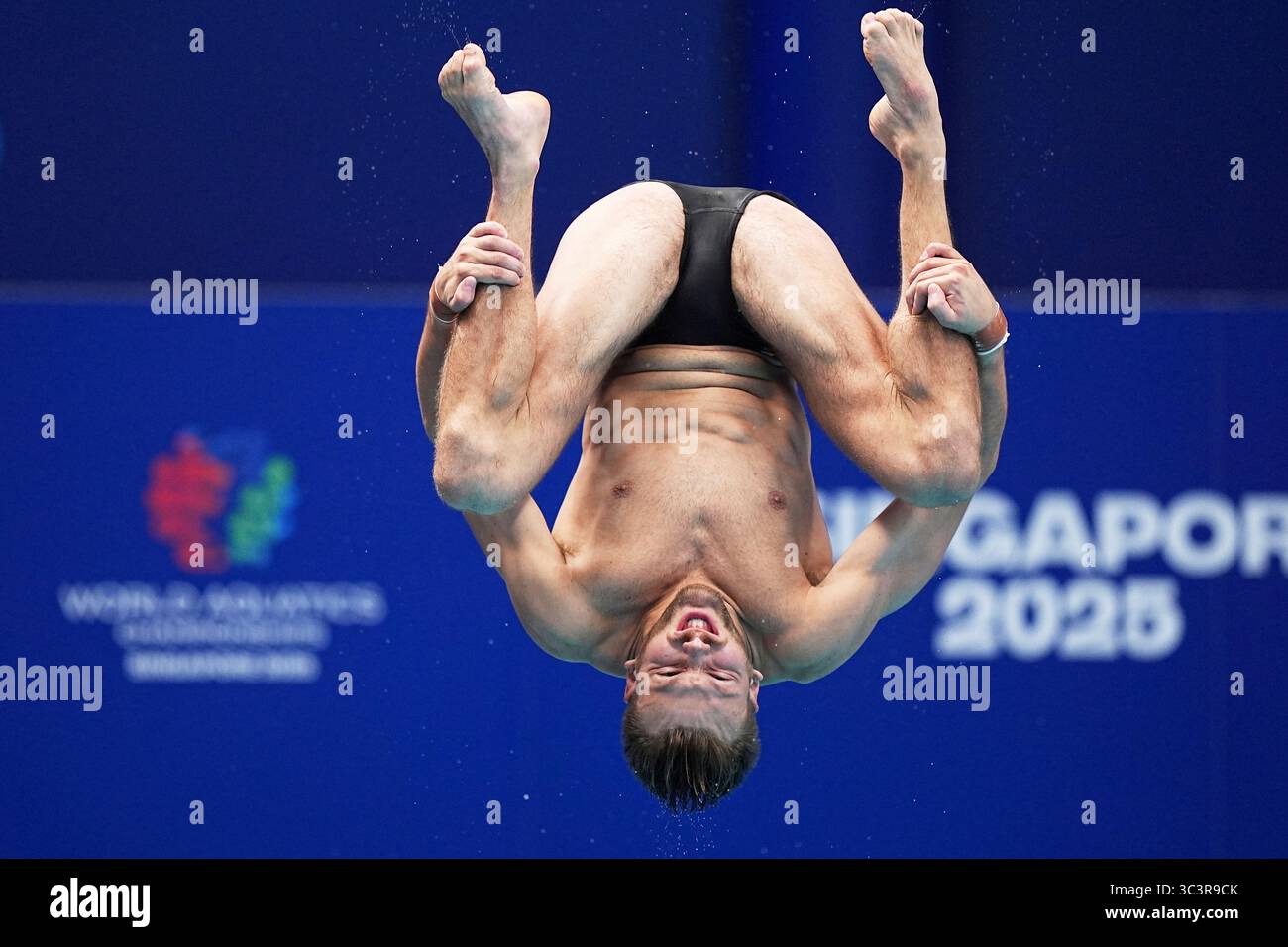 Tazman Abramowicz of Canada competes in the men's 1m springboard diving ...