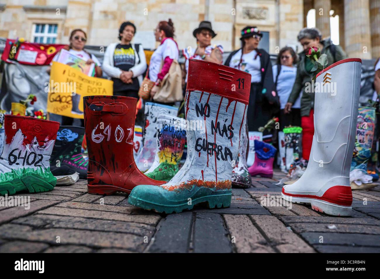 Bogota, Colombia. 17th Nov, 2024. Painted boots are being installed in ...