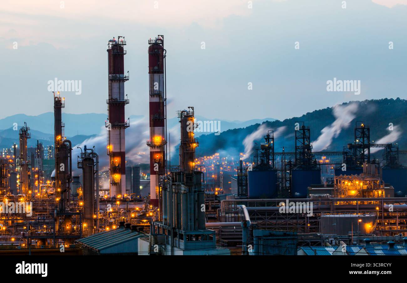 The lights of the industrial complex turn on even at night Stock Photo ...