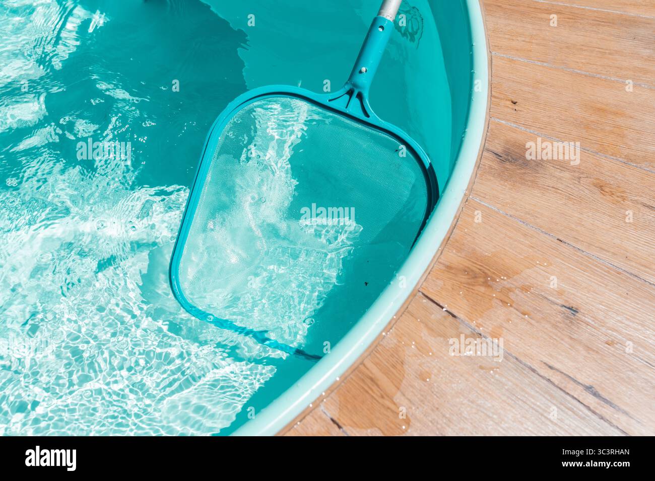 Cleaning the Swimming pool closeup background Stock Photo - Alamy