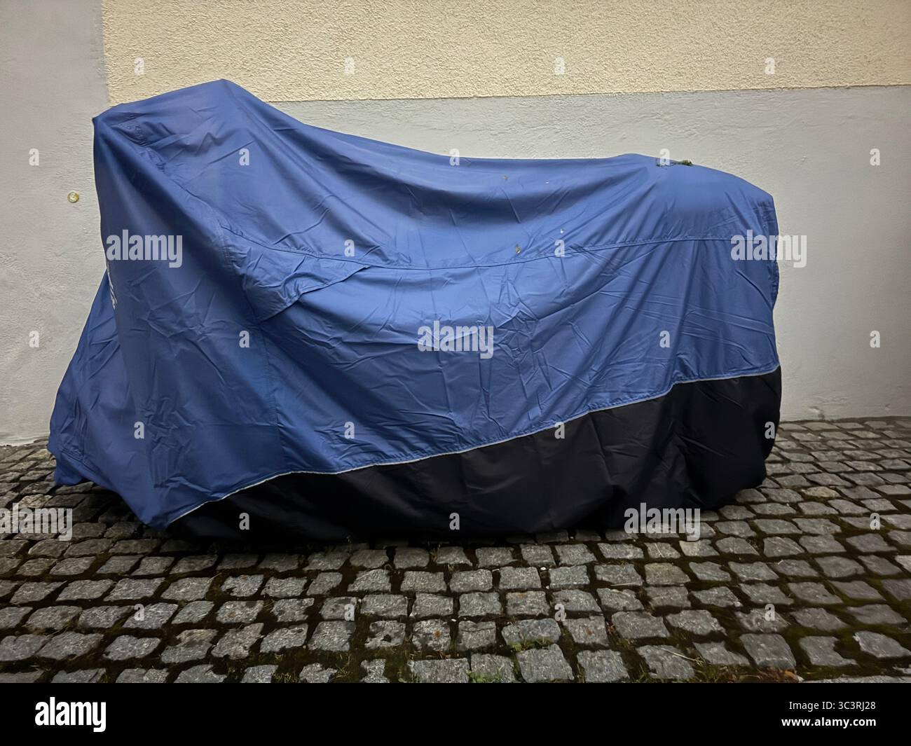 Black cloth draped over hi-res stock photography and images - Alamy