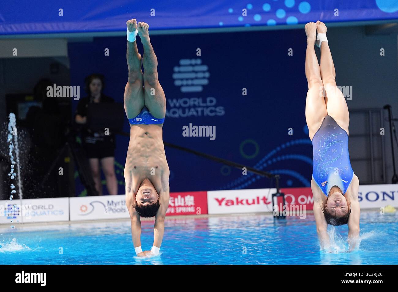 Lee Yiat Qing and Clement Elvis Priestly Anak of Malaysia compete in ...