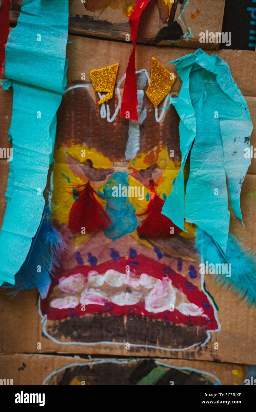 Kids art. Handcrafted mask art using cardboard, vibrant paint, and ...
