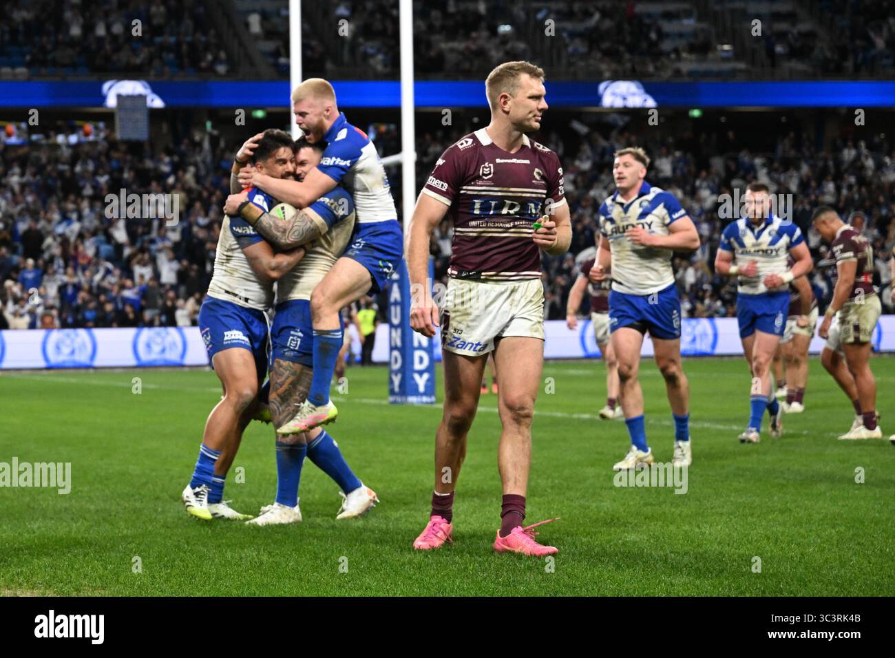 The Bulldogs celebrate Enari Tuala’s try during the NRL Round 21 match ...