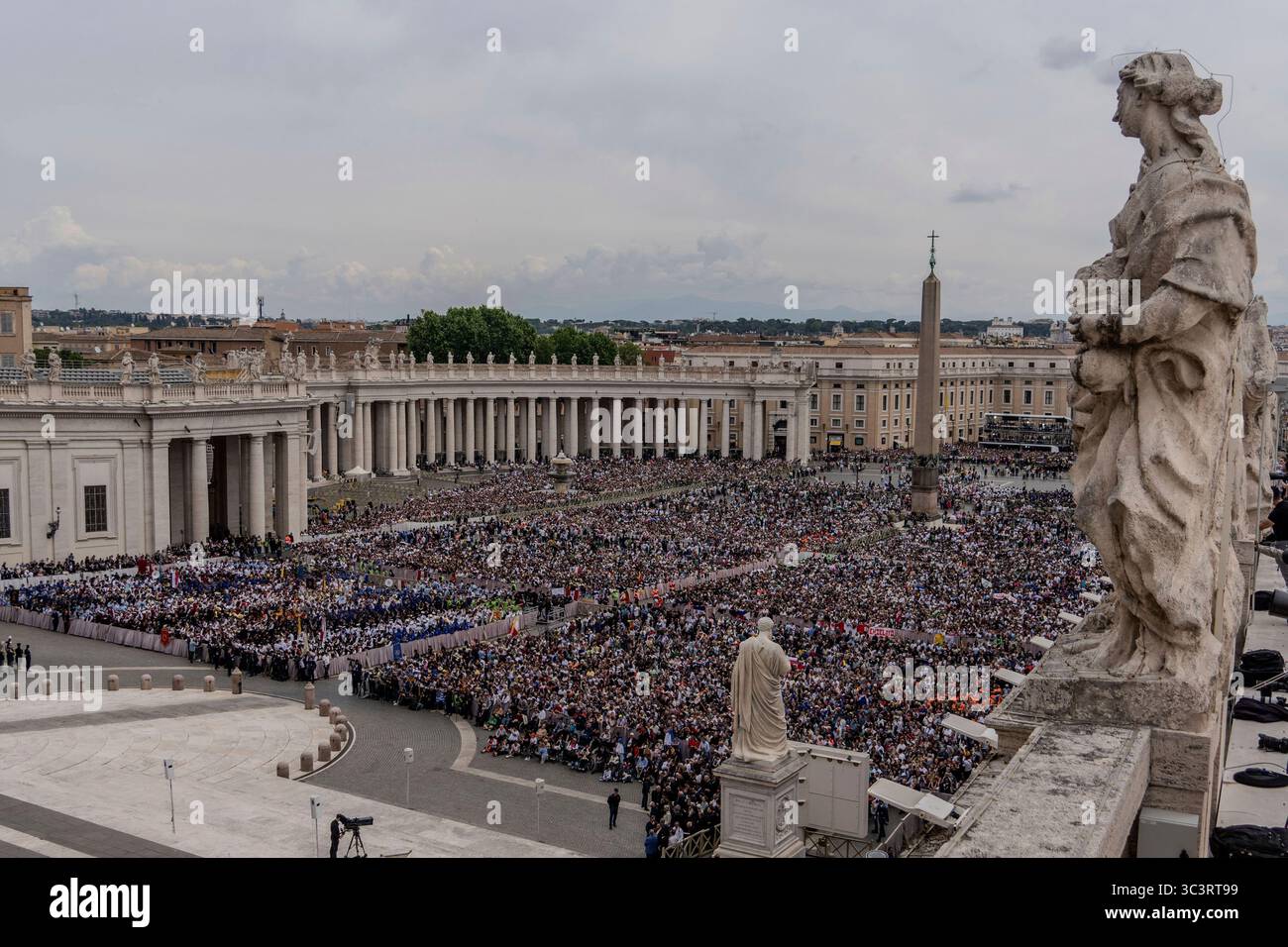 FILE - A crowd gathers in St. Peter's Square at the Vatican, where ...