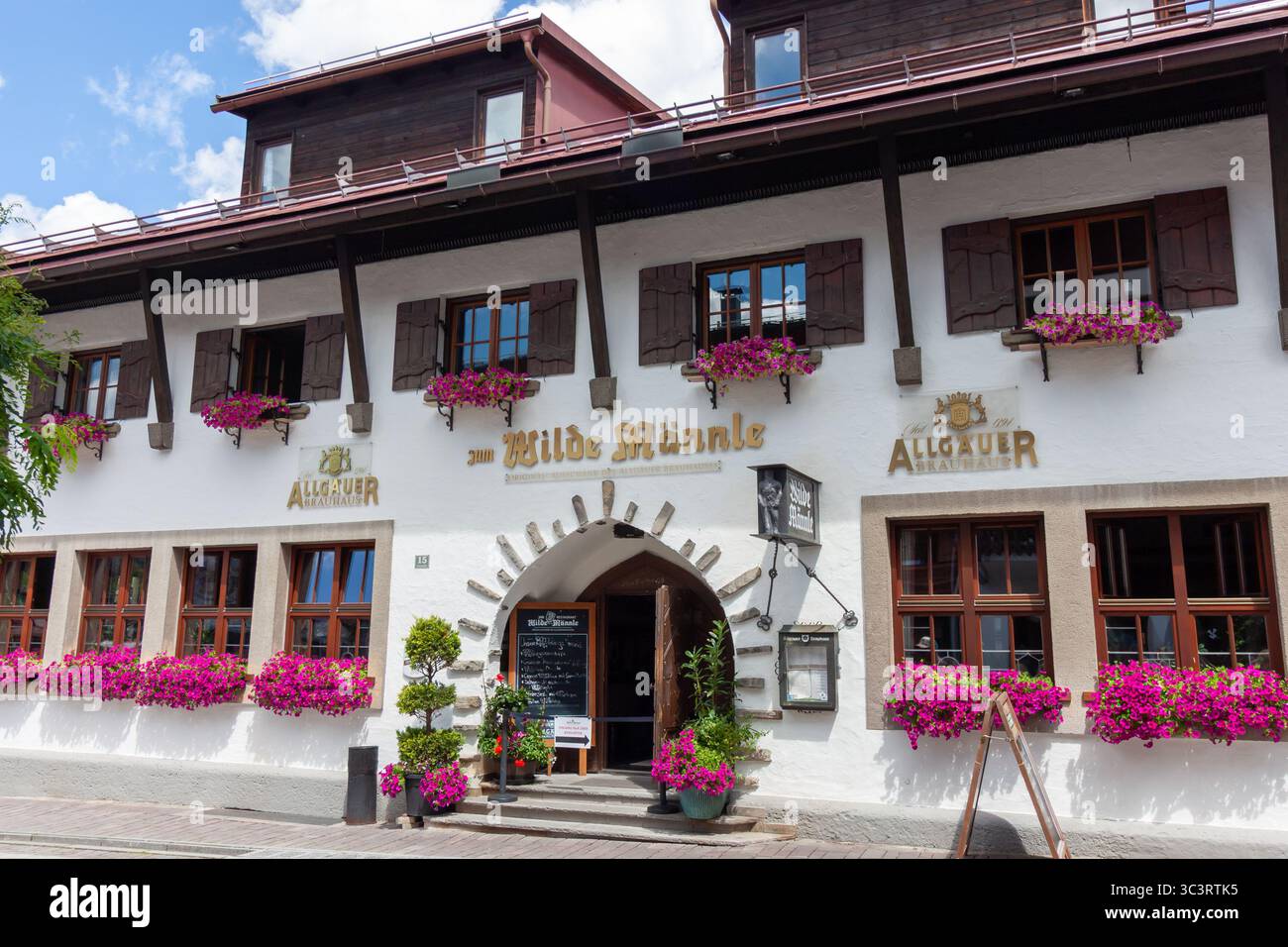 OBERSTDORF, GERMANY - JULY 17, 2025: A charming traditional Bavarian ...