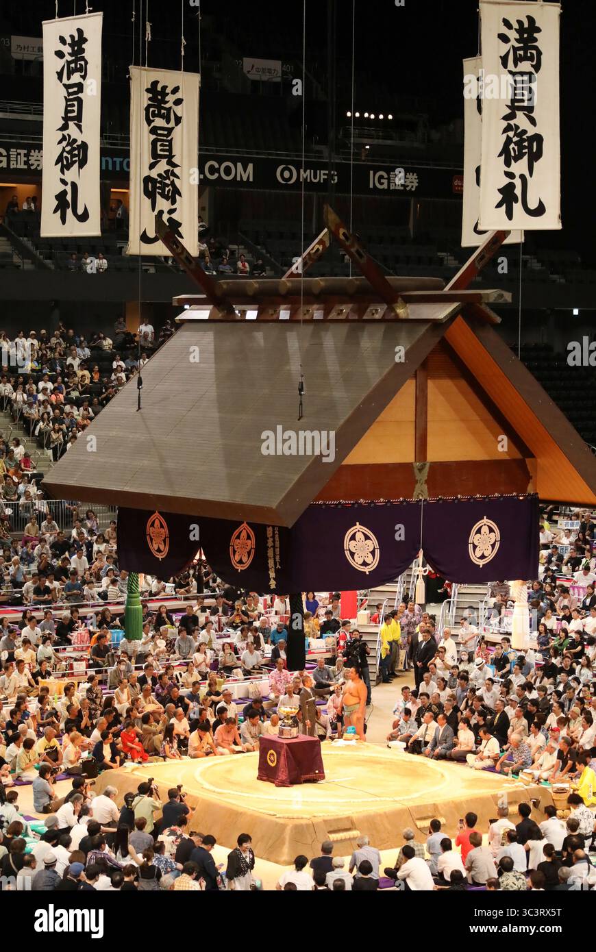 East Maegashira 15 Yoshinari Kotoshoho answers questions during an ...