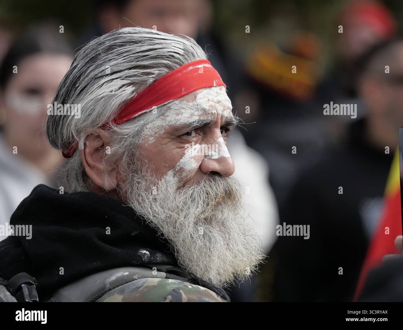 Portrait of an Aboriginal elder with white painted hair and face ...
