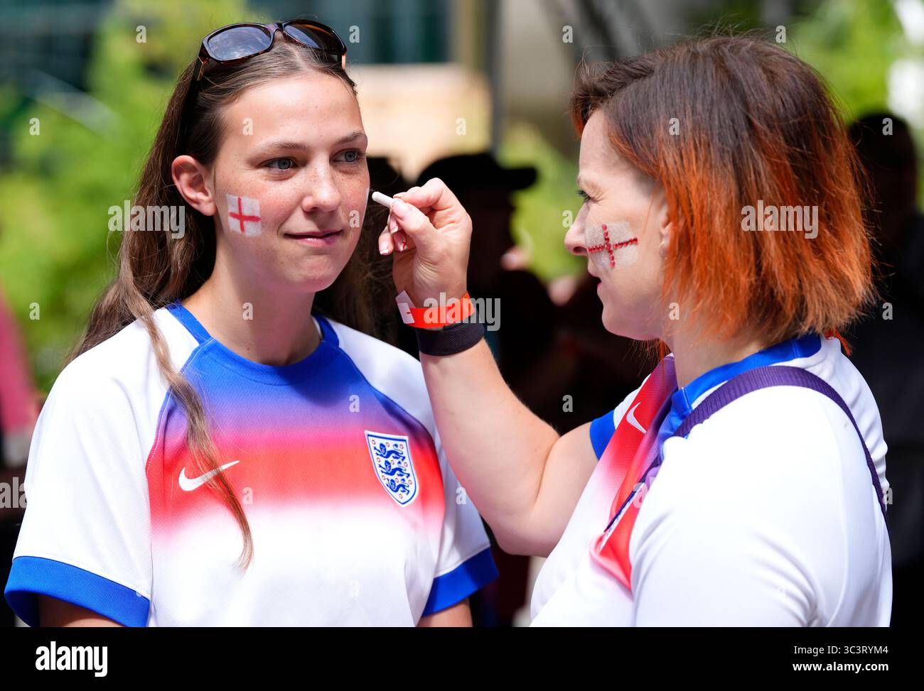 England fans put face paint on ahead of the UEFA Women's Euro 2025 ...