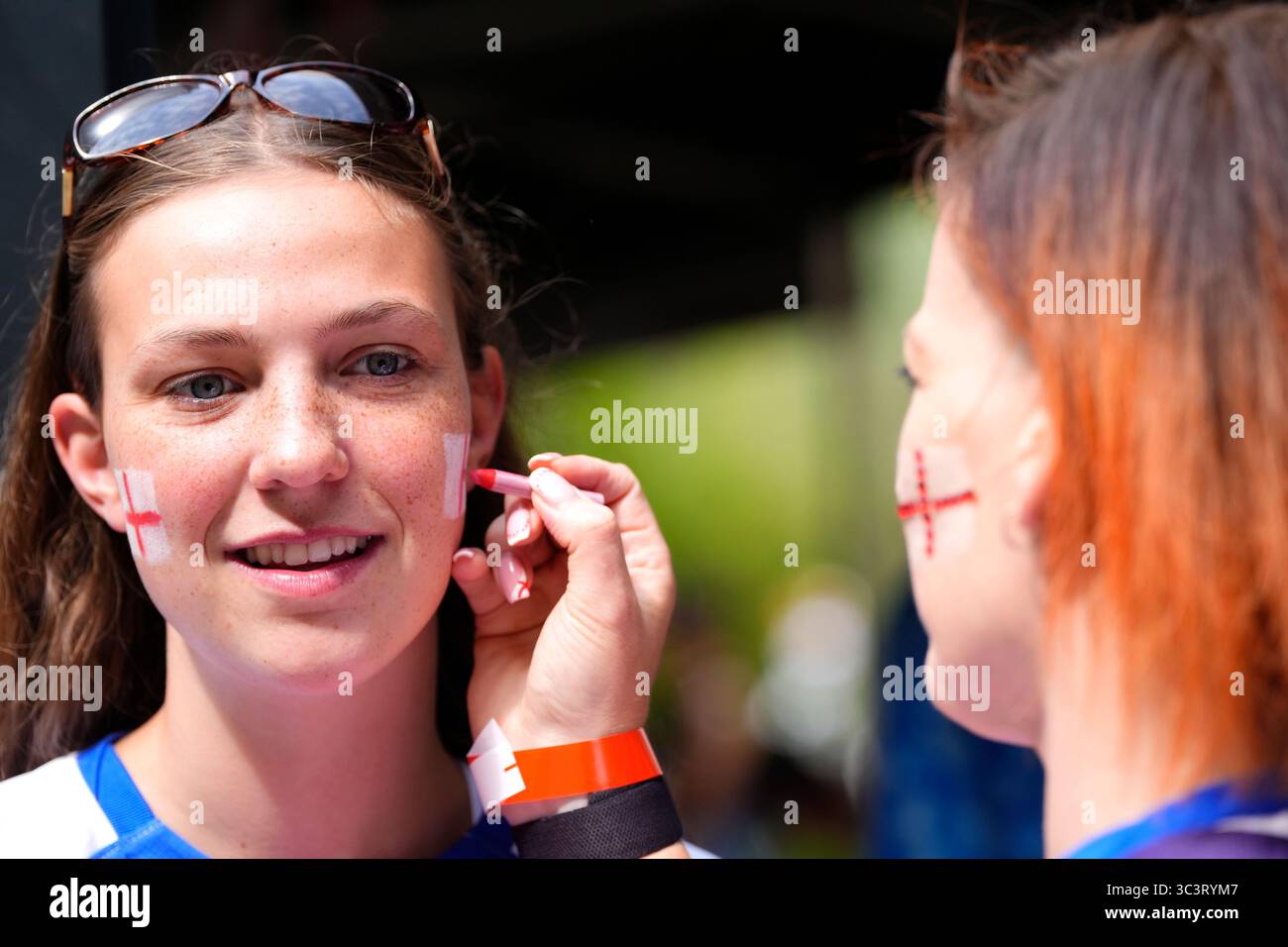 England fans put face paint on ahead of the UEFA Women's Euro 2025 ...