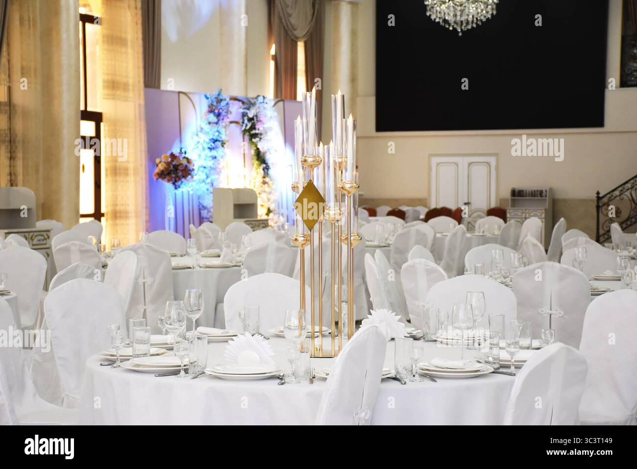 Large spacious light banquet hall at a wedding. Wedding banquet hall ...