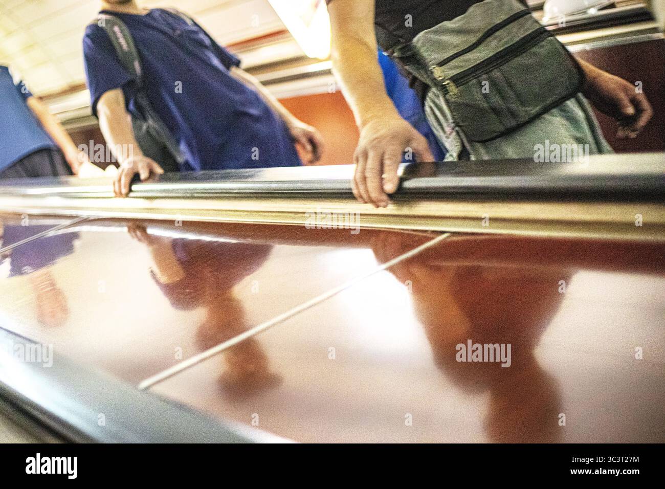 Descent on escalator in subway hi-res stock photography and images - Alamy