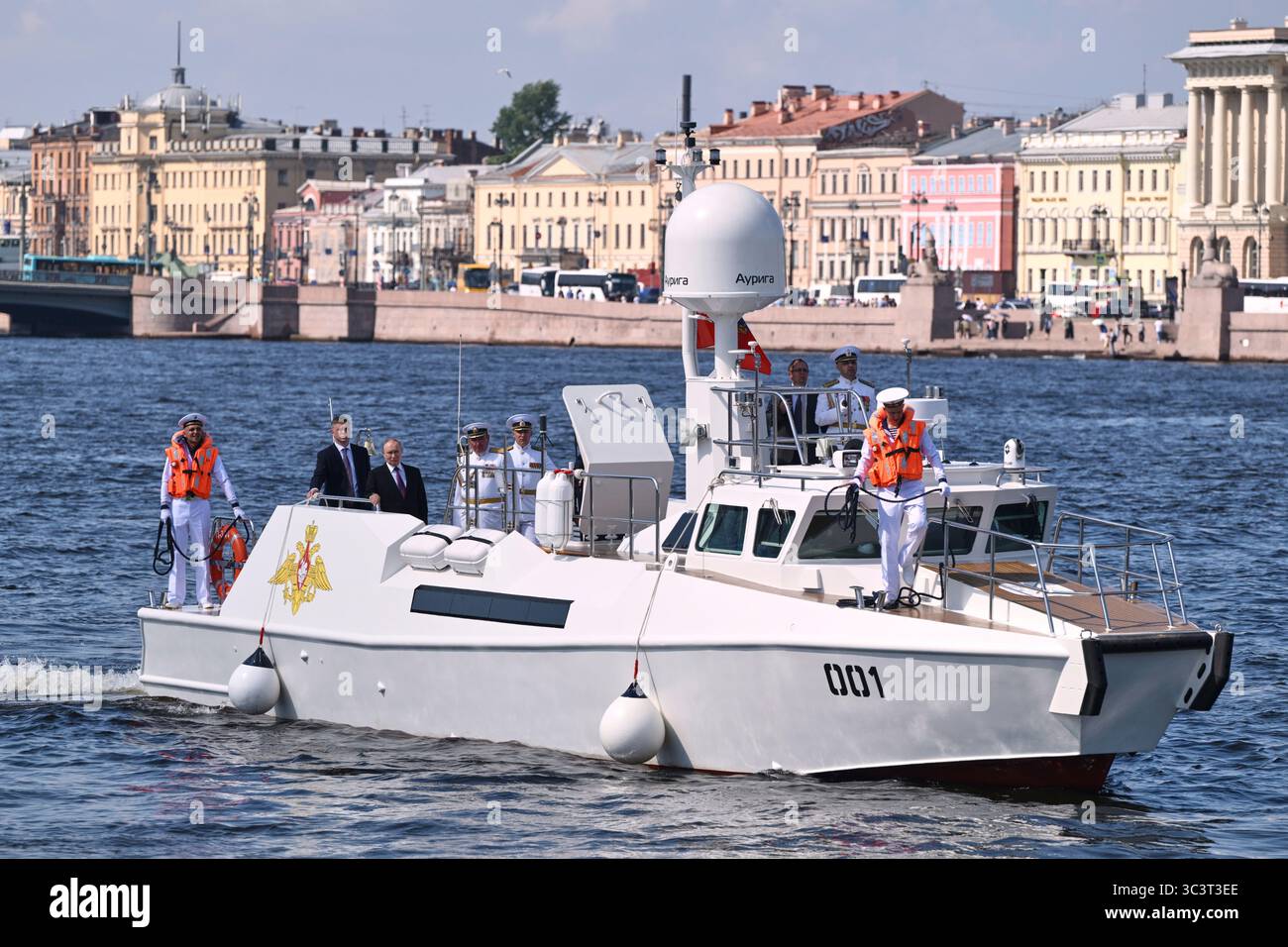 Russian President Vladimir Putin, third from left, stands aboard the ...