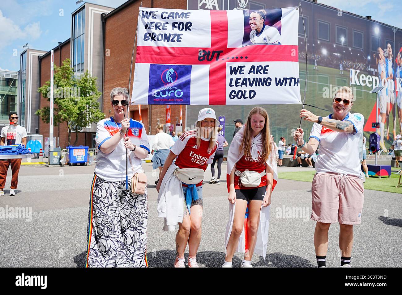 England fans hold up a large flag in support of England's Lucy Bronze ...