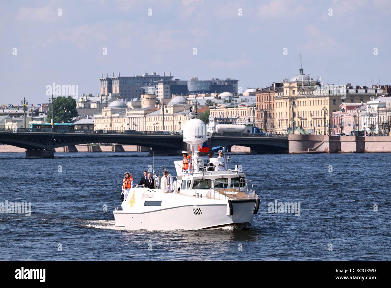 Russian President Vladimir Putin, third from left, stands aboard the ...