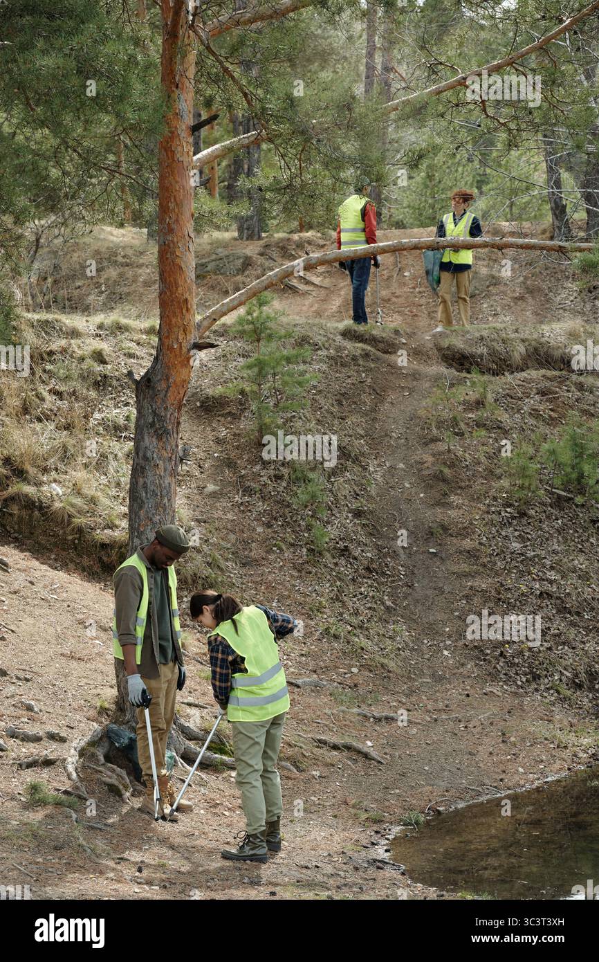 Multiethnic Young Adults Collecting Litter during Environmental Cleanup ...