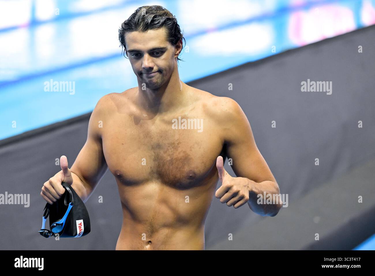 Thomas Ceccon of Italy reacts after competing in the swimming 50m ...