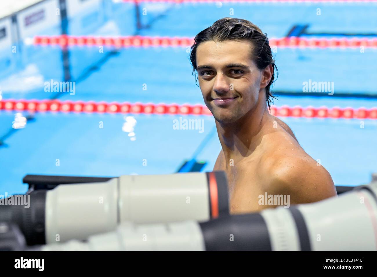 Thomas Ceccon of Italy reacts after competing in the swimming 50m ...