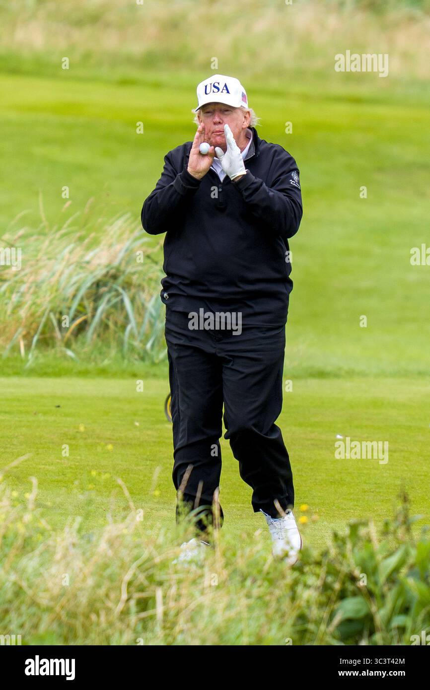 US President Donald Trump plays golf at his Trump Turnberry golf course ...