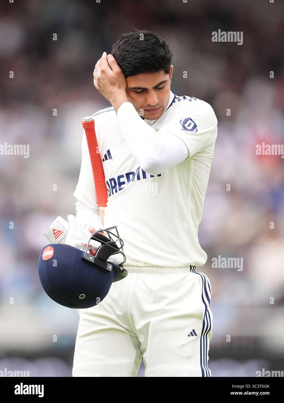 India's Shubman Gill leaves the field after being caught off the ...