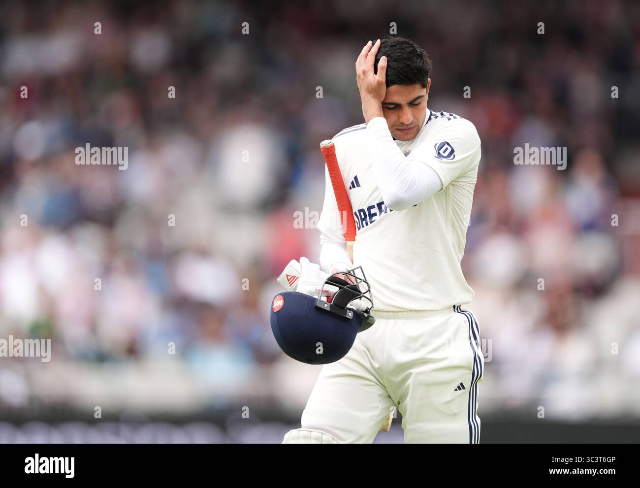 India's Shubman Gill leaves the field after being caught off the ...
