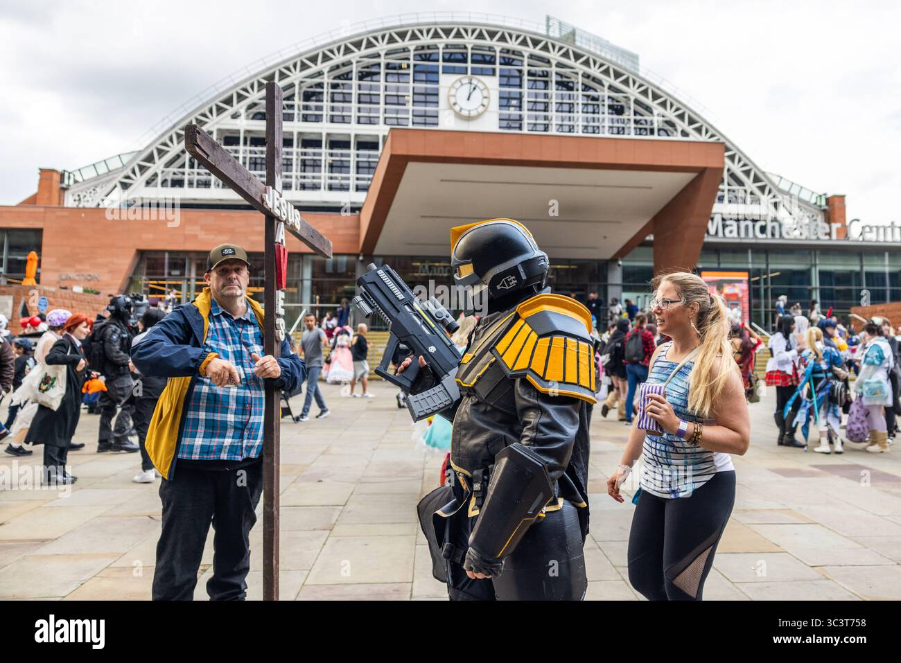Manchester, UK. 26 JUL, 2025. Character in armour walks past Christian ...