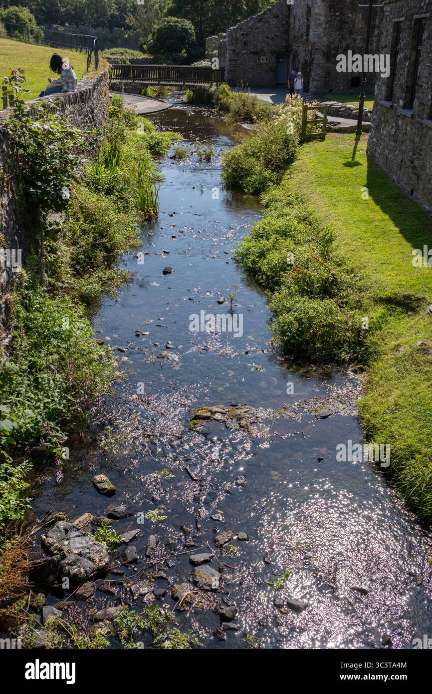 River Alun stream running alongside the Bishops Palace in Pembrokeshire ...