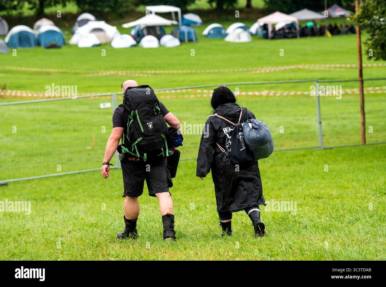 27 July 2025, Schleswig-Holstein, Wacken: Participants of the Wacken ...