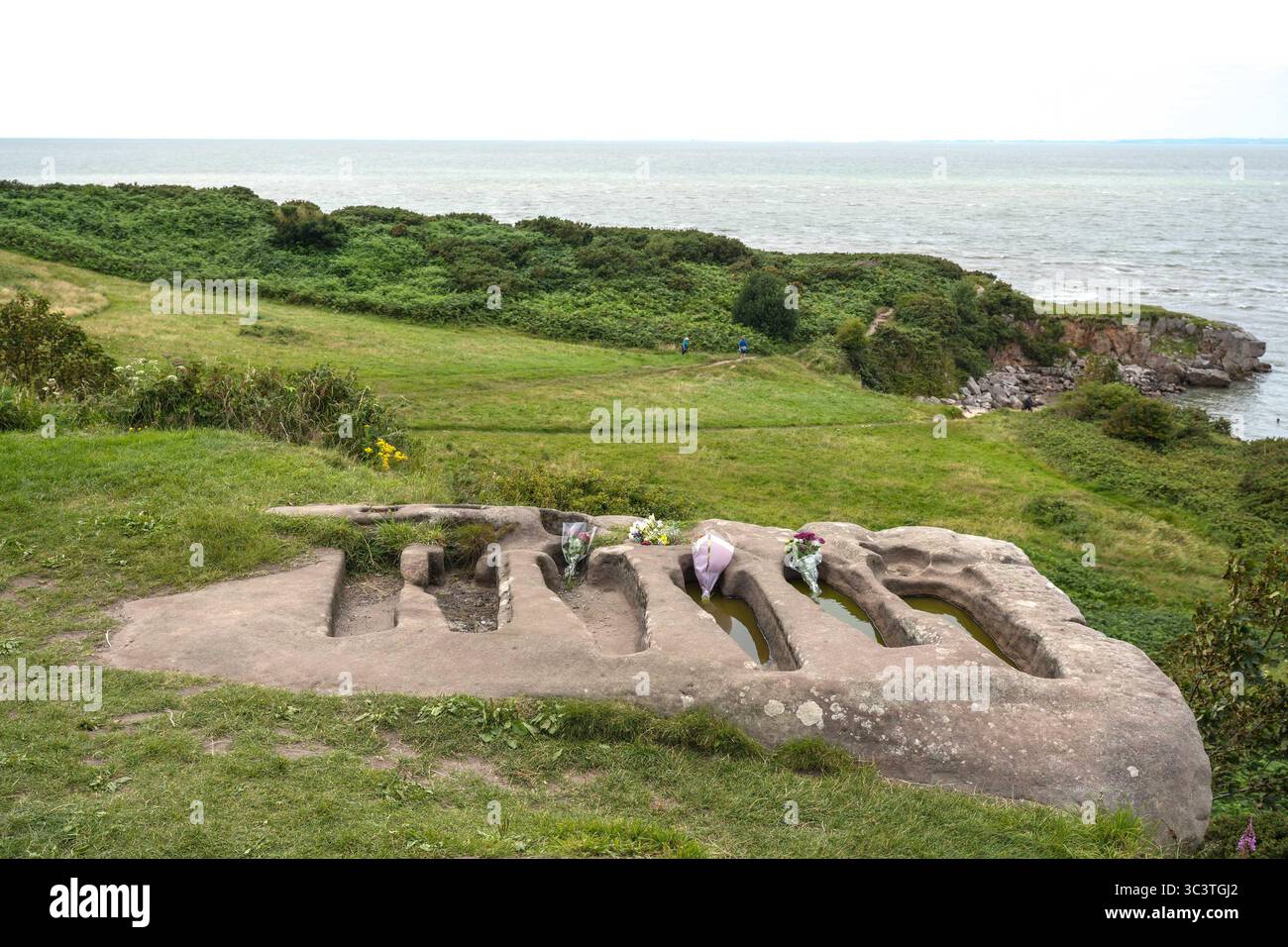 St Patrick's Chapel, Heysham 27th July 2025: Floral tributes have been ...