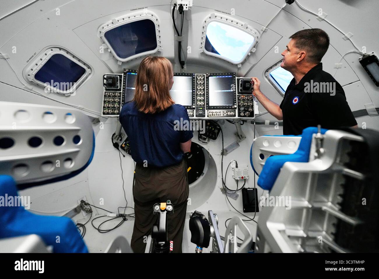 Jenni Gibbons, left, and mission specialist Jeremy Hansen, both ...