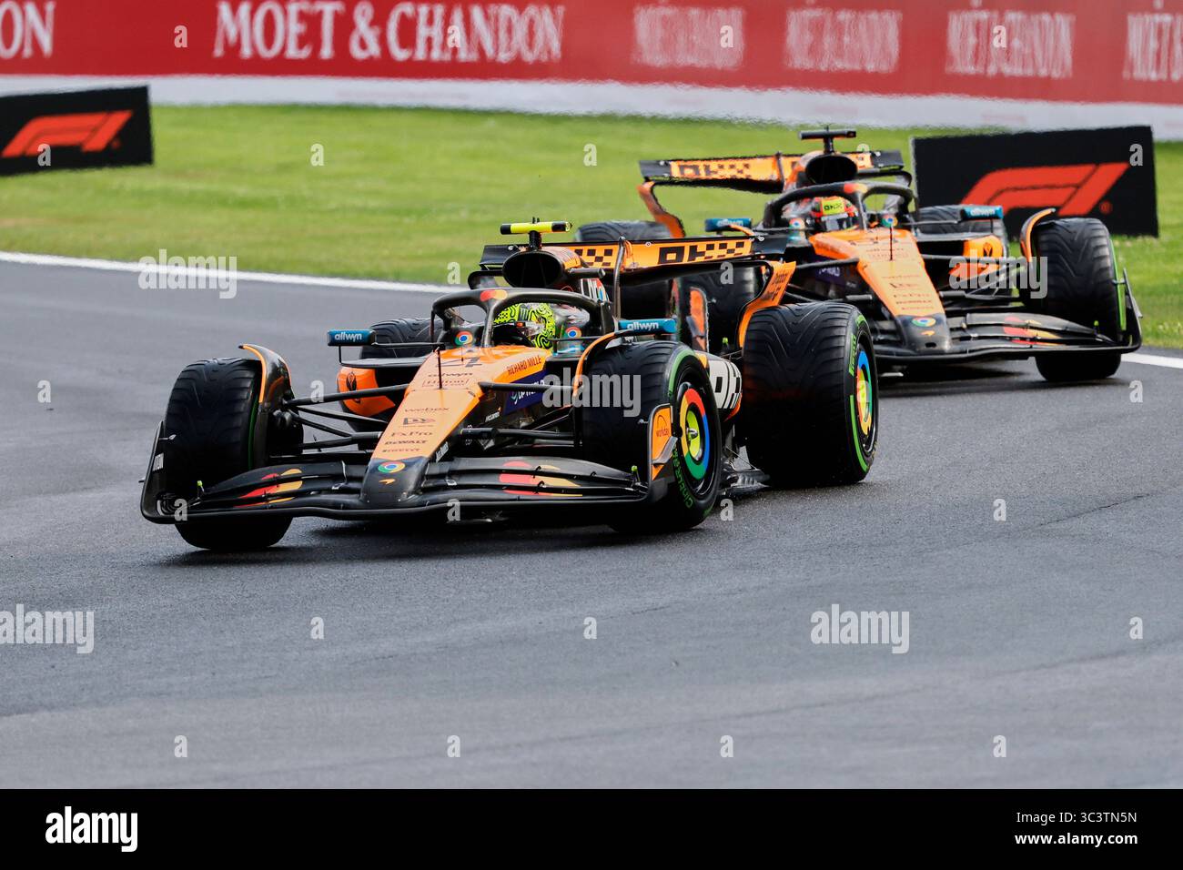 McLaren driver Lando Norris of Britain steers his car ahead of McLaren ...