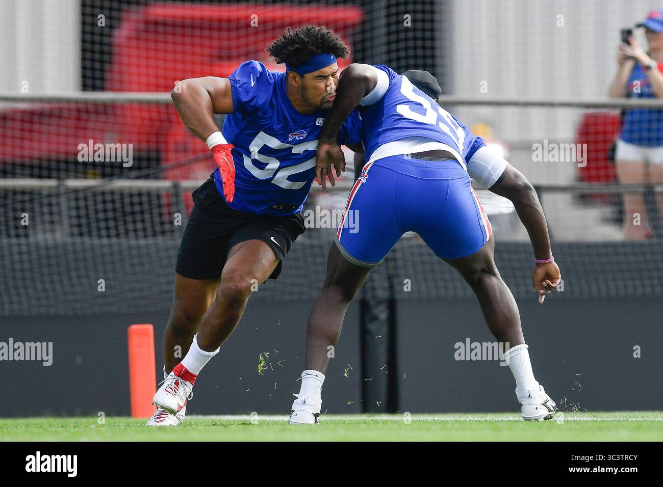 Buffalo Bills defensive ends Hayden Harris, left, and Paris Shand run a ...