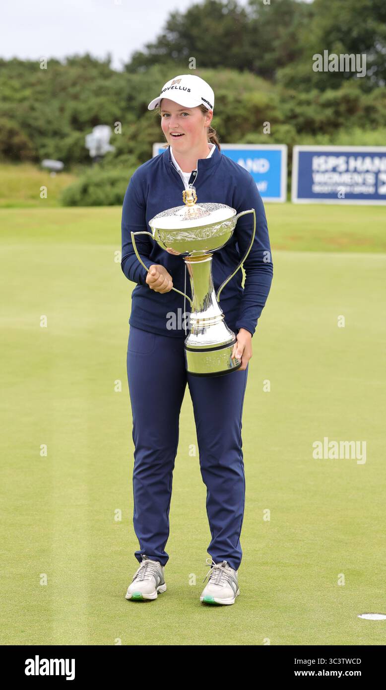 England's Lottie Woad holds the trophy after winning the 2025 ISPS ...