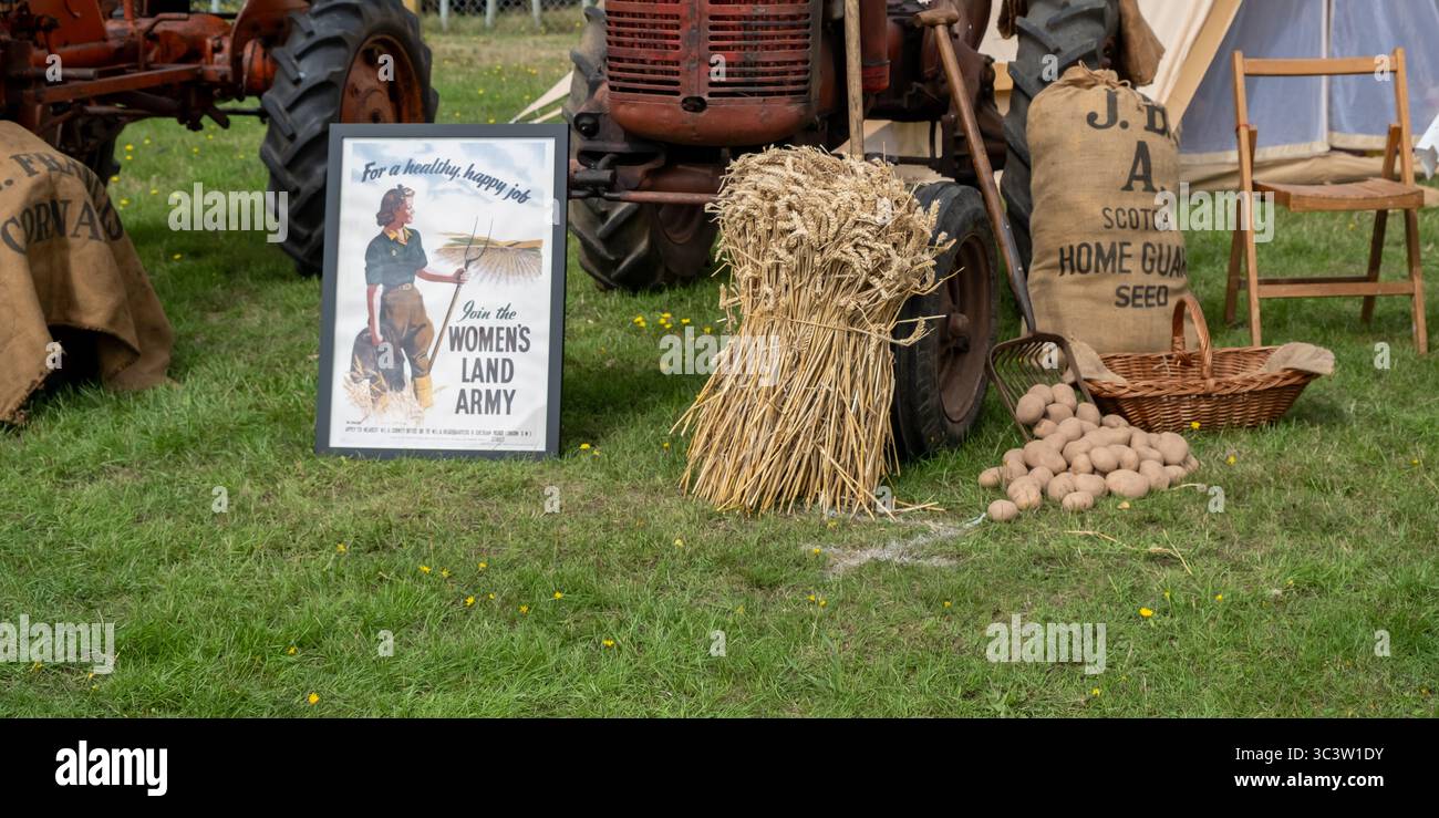 Historic display at the 2025 Suffolk military show. A land girls poster ...