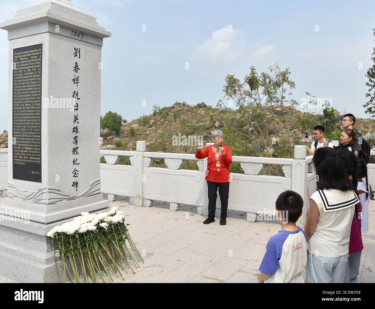 Hong Kong, China. 15th Mar, 2025. Lin Zhen (L), recounts the heroic ...