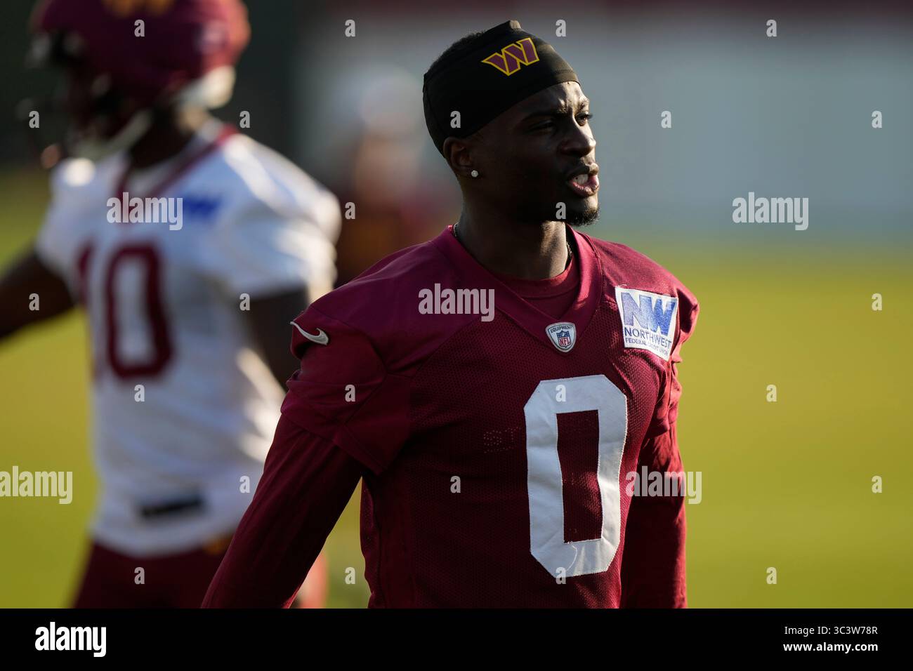 Washington Commanders cornerback Mike Sainristil (0) arrives for ...