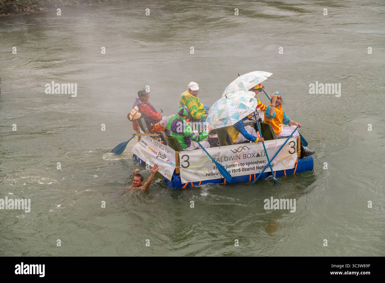 Contestants in the Lewes to Newhaven Raft Race pass under Southease ...