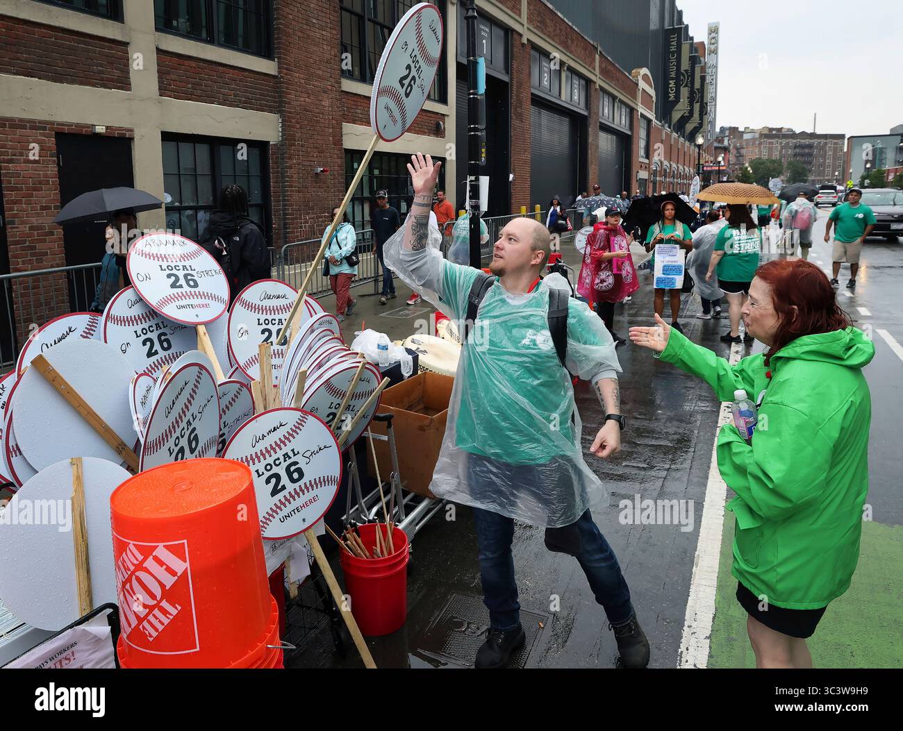 Striking concession workers get ready to picket outside of Fenway Park ...