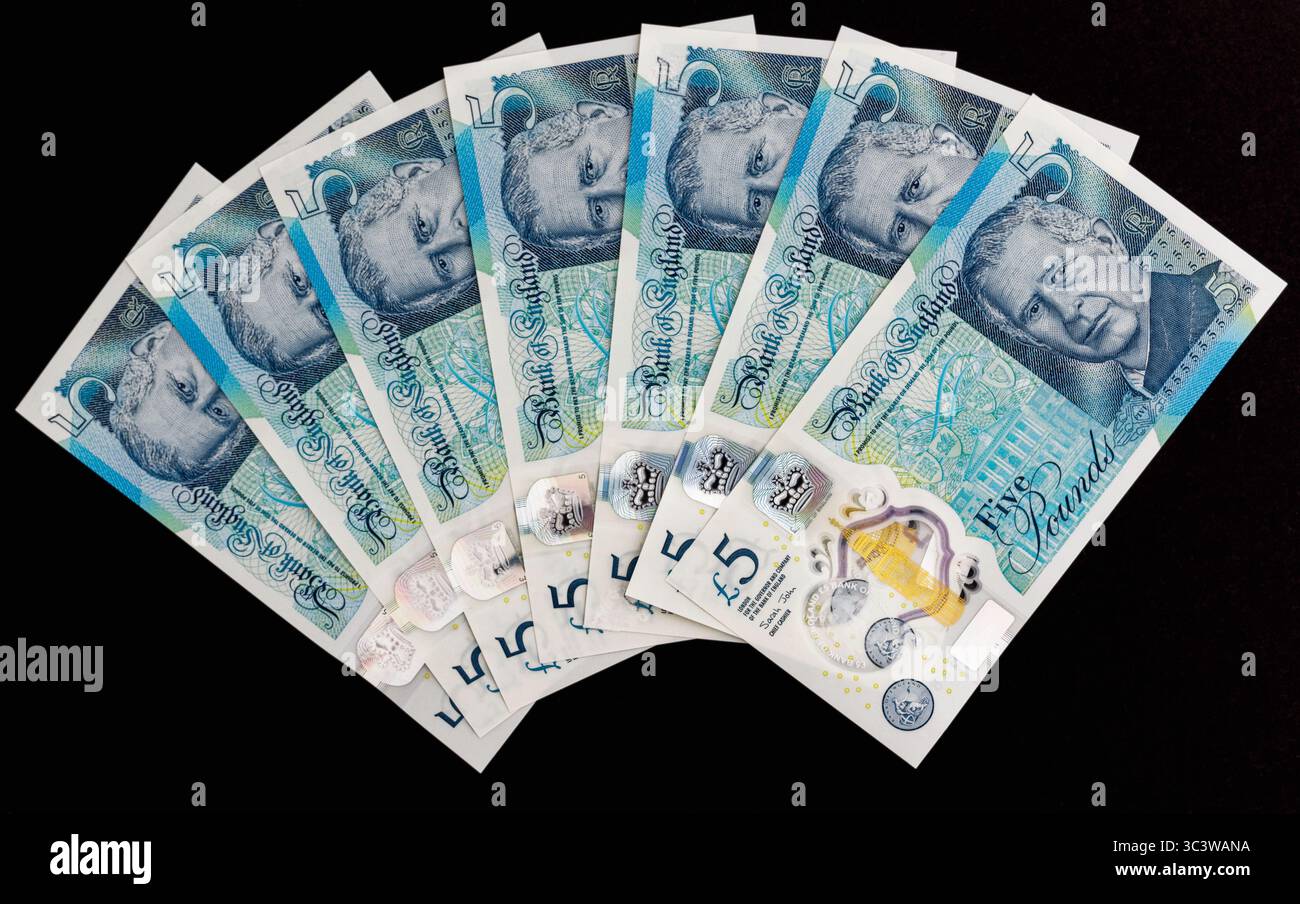 Fan of King Charles the third five pound notes Stock Photo - Alamy